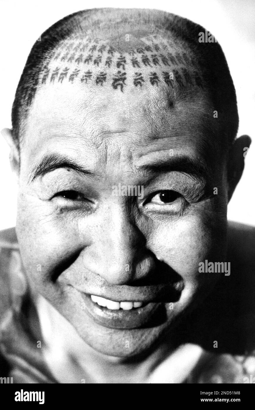 Mitsuaki Ohwada of Yokohama, Japan, displays tattoos of Sanskrit ...