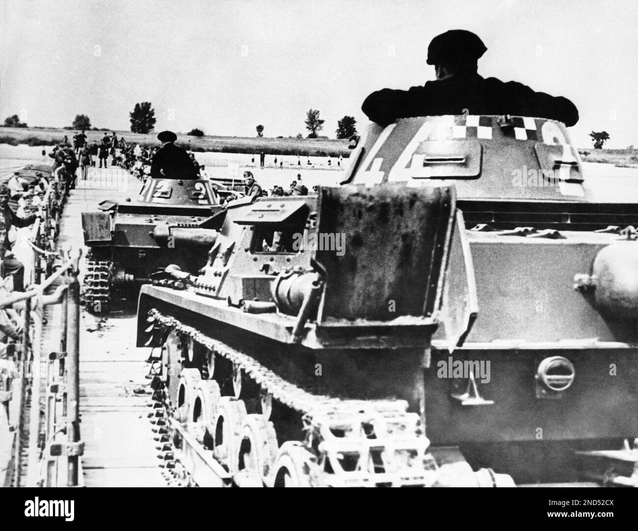 Two German tanks cross a pontoon bridge thrown across the River Elbe to ...