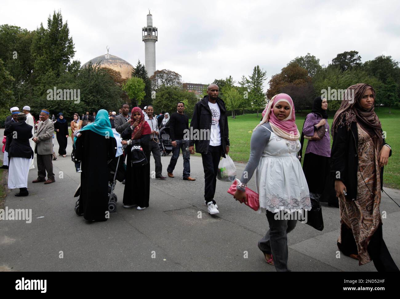 British Muslims walk in London's Regent park after they concluded their ...