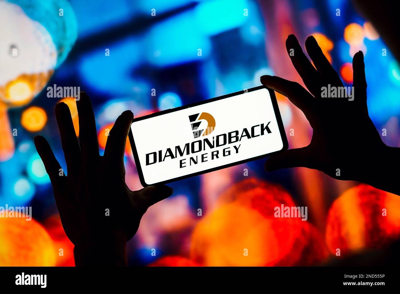 In this photo illustration, the Diamondback Energy logo is seen ...