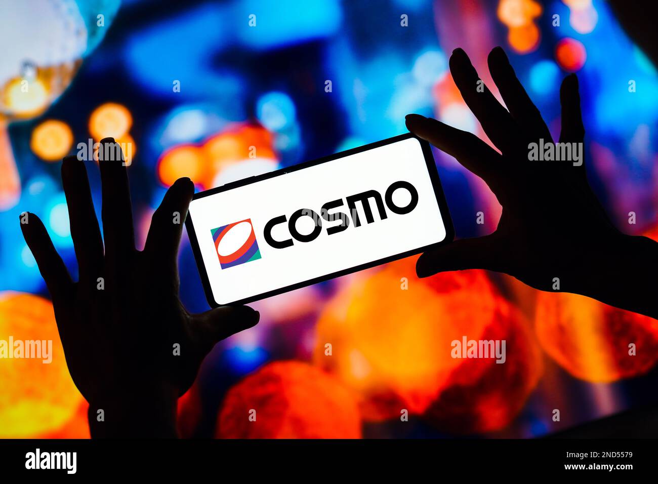 In this photo illustration, the Cosmo Energy Holdings logo is seen ...