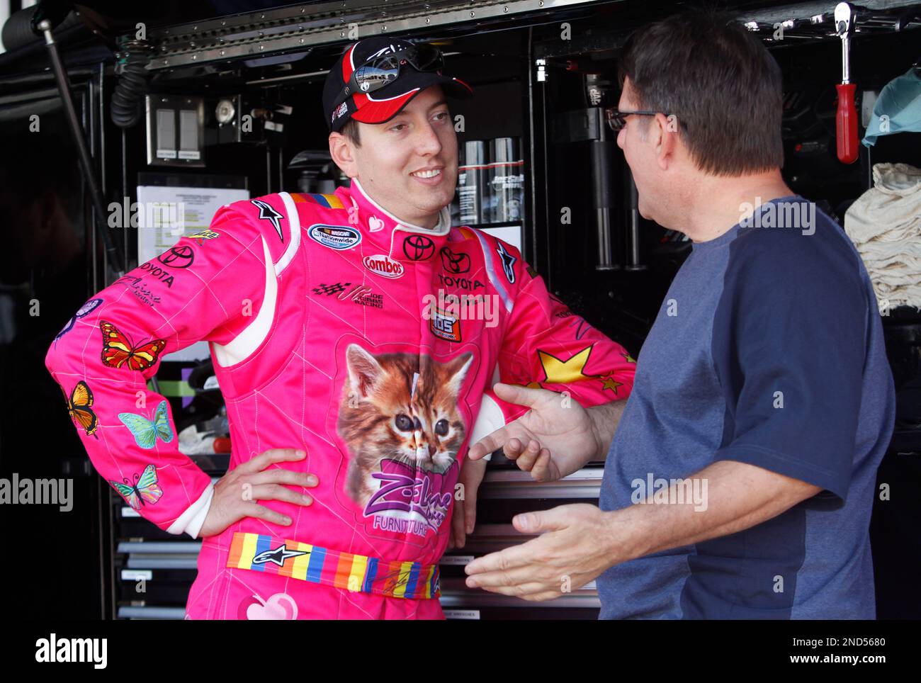NASCAR driver Kyle Busch, left, talks with a fan during testing for ...