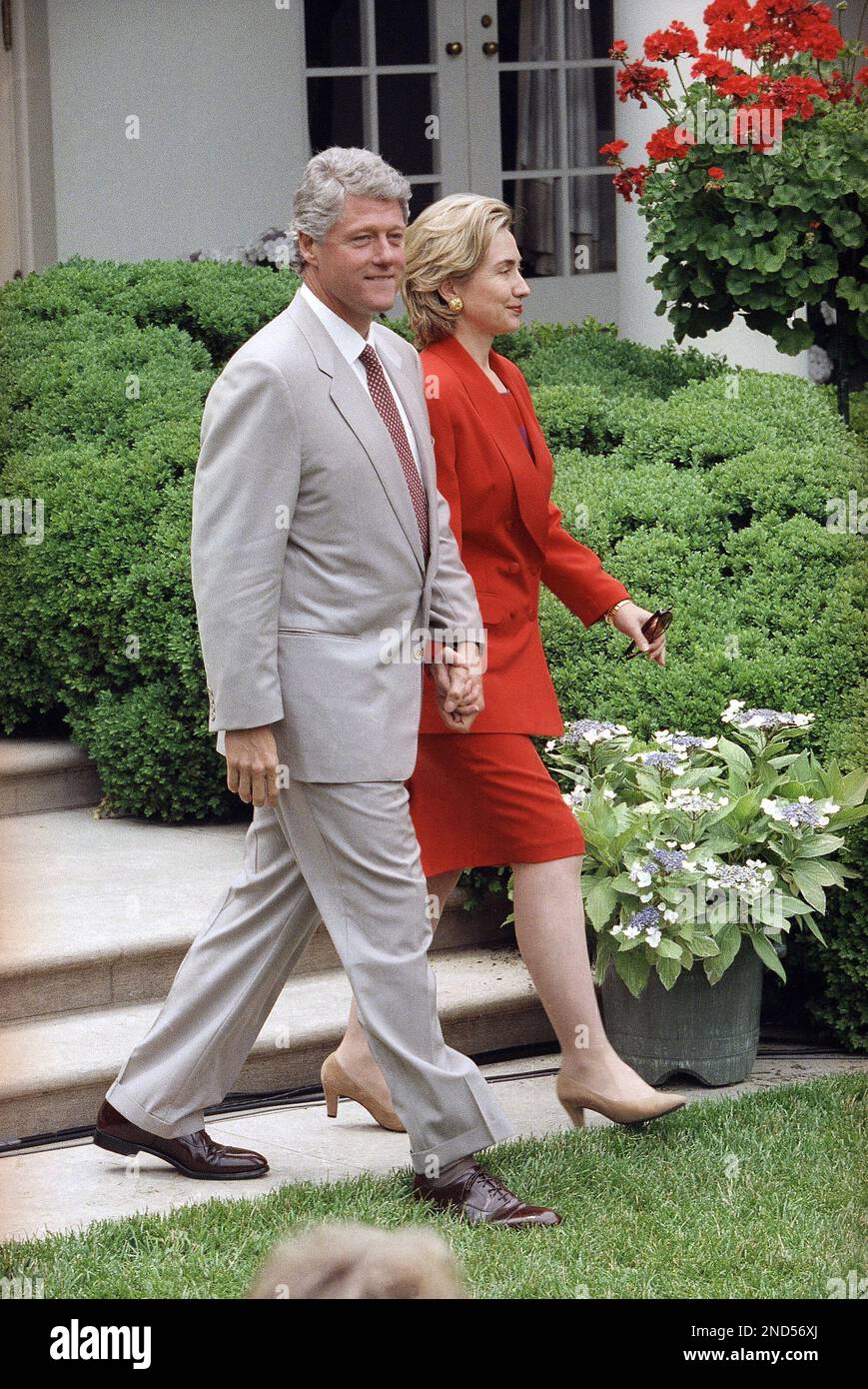 Walking holding hands looking away authority hi-res stock photography ...