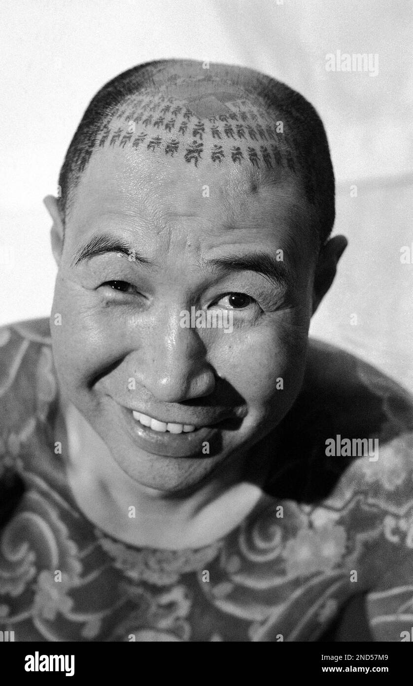 Mitsuaki Ohwada of Yokohama, Japan, displays tattoos of Sanskrit ...