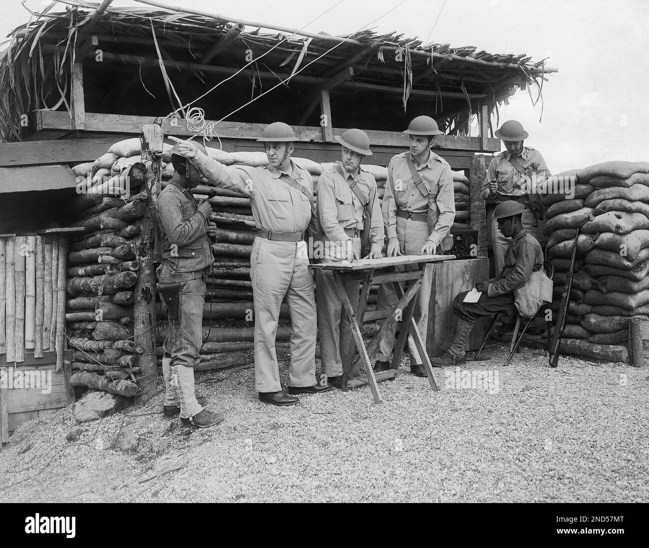U.S. officers have the help of U.S. African American soldiers at a ...