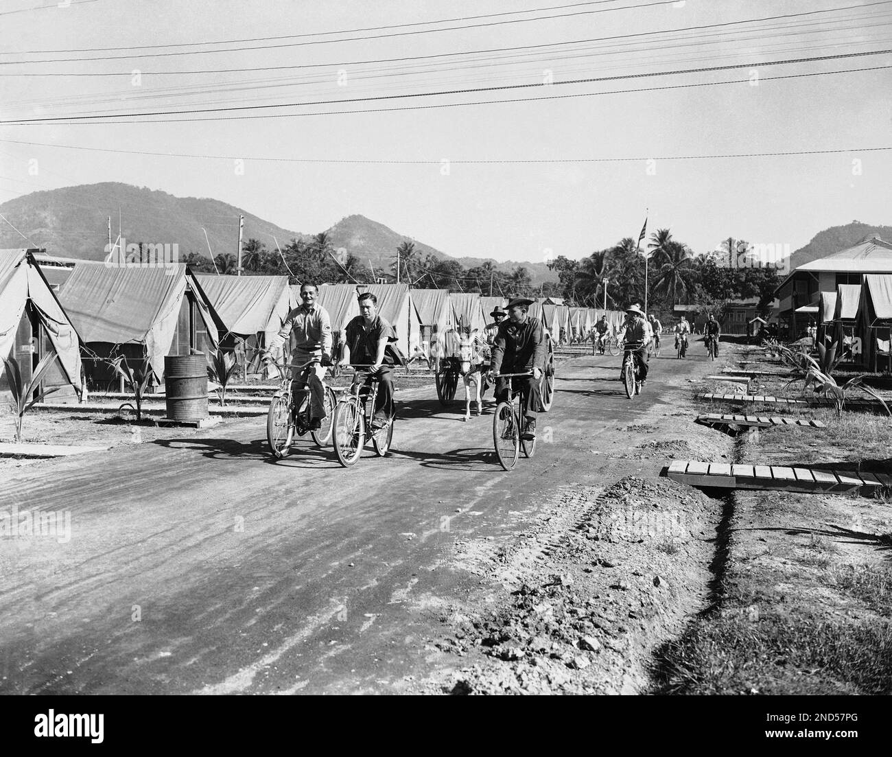 American soldiers use bicycles for transportation at the Army base in ...