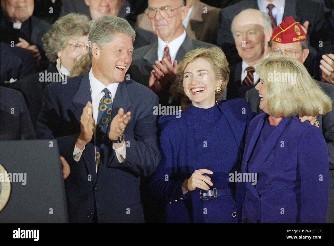 President Bill Clinton shares a laugh with his wife Hillary and Tipper ...