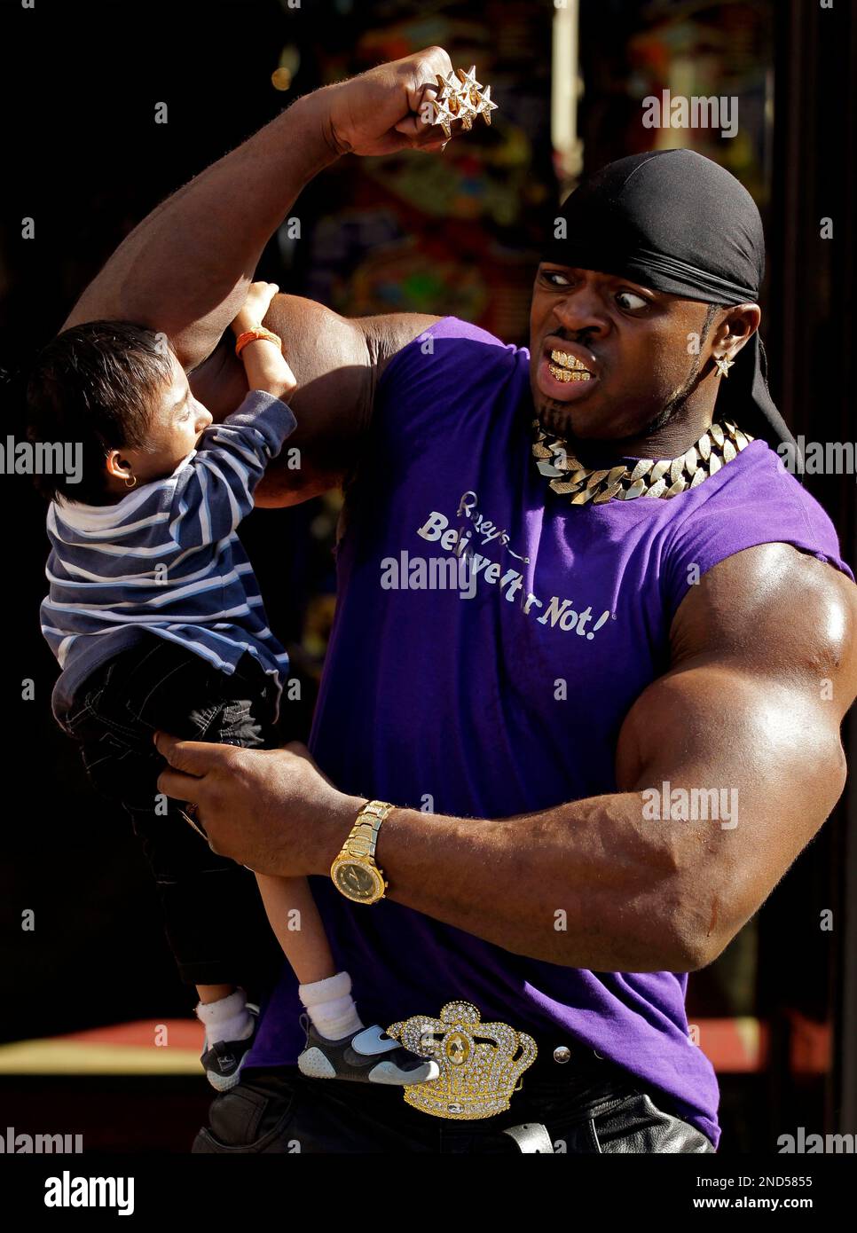 The smallest known person on earth Khagendra Thapa Magar from Nepal poses for photographs with ...