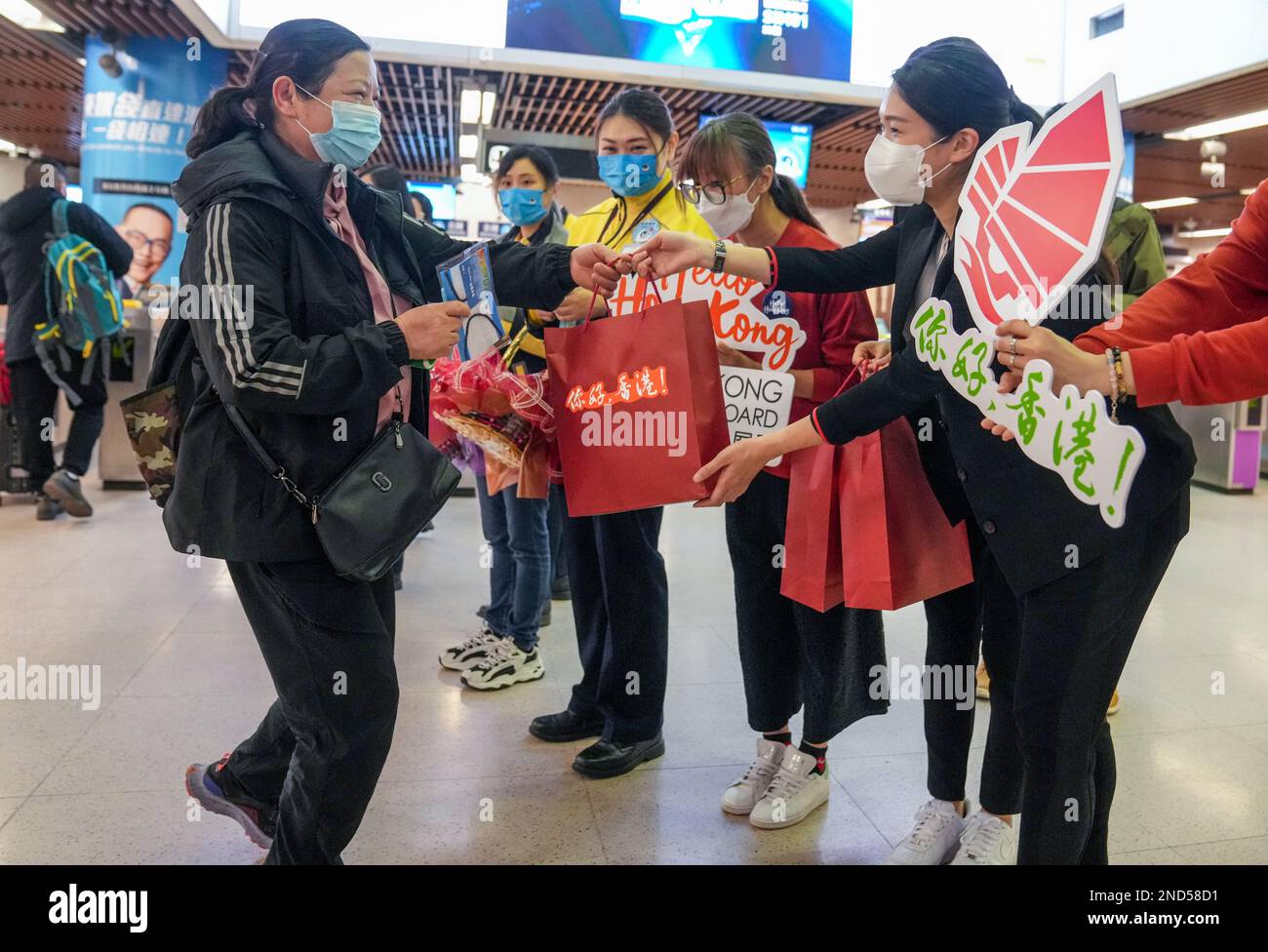 Inbound passengers cross the border at Lo Wu. The checkpoint begins ...