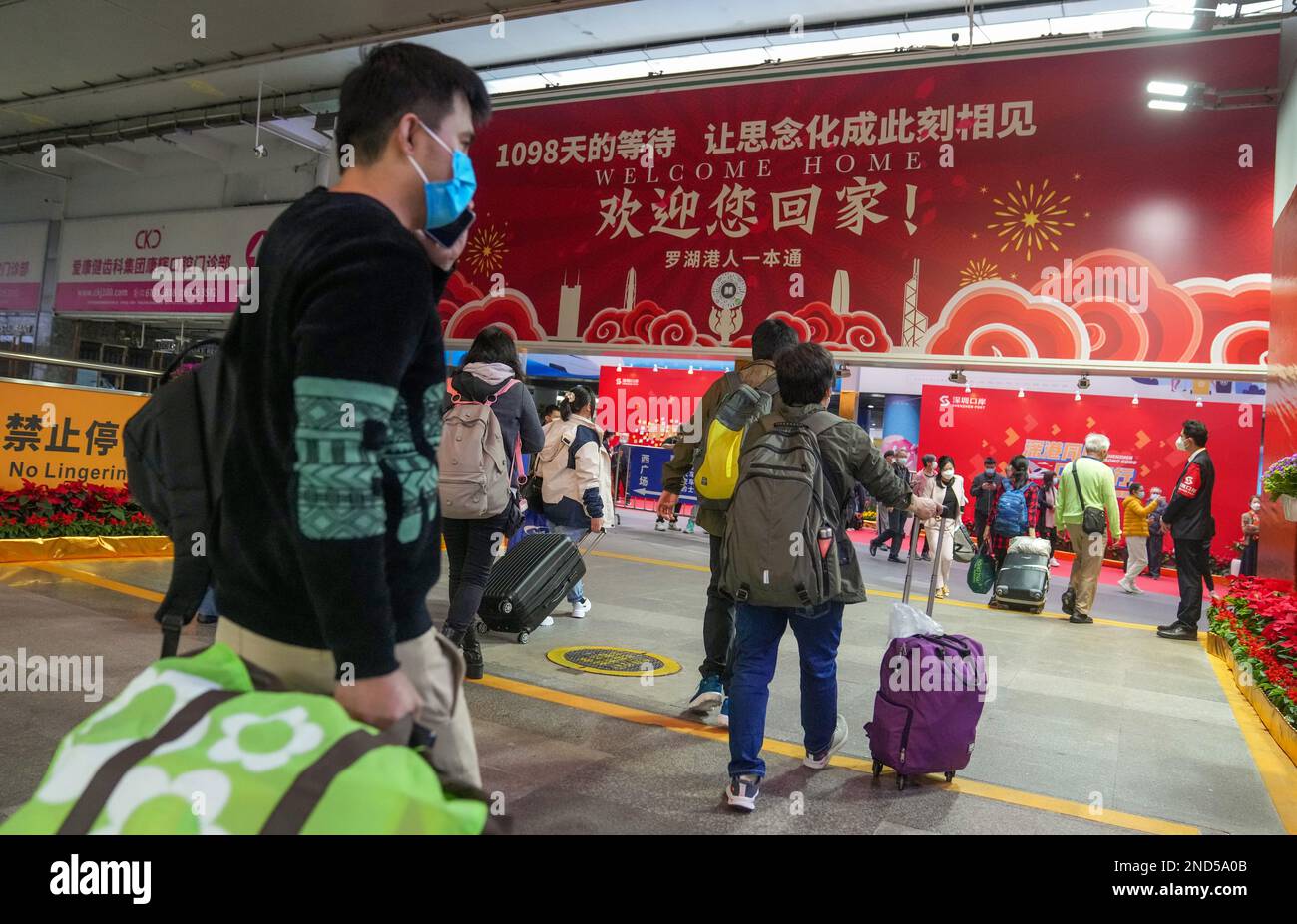 Travellers arrive at Lo Wu Control Point in Shenzhen. The border begin ...