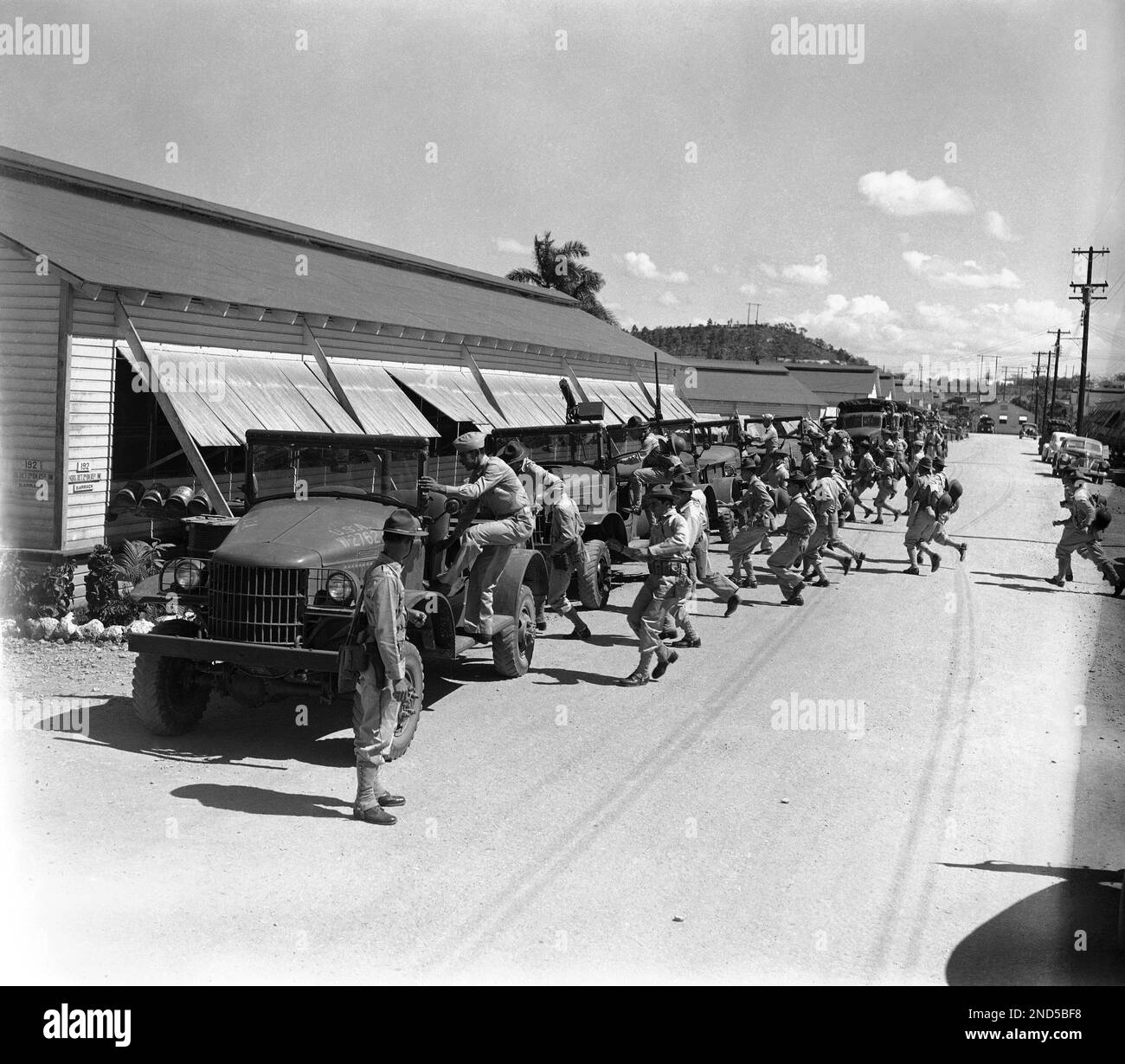 An alert call brings these Puerto Rican soldiers of the American Army ...
