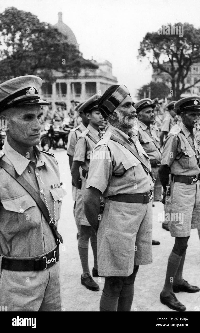 Various types of East Indians. Center bearded, turbaned Sikh, flanked ...