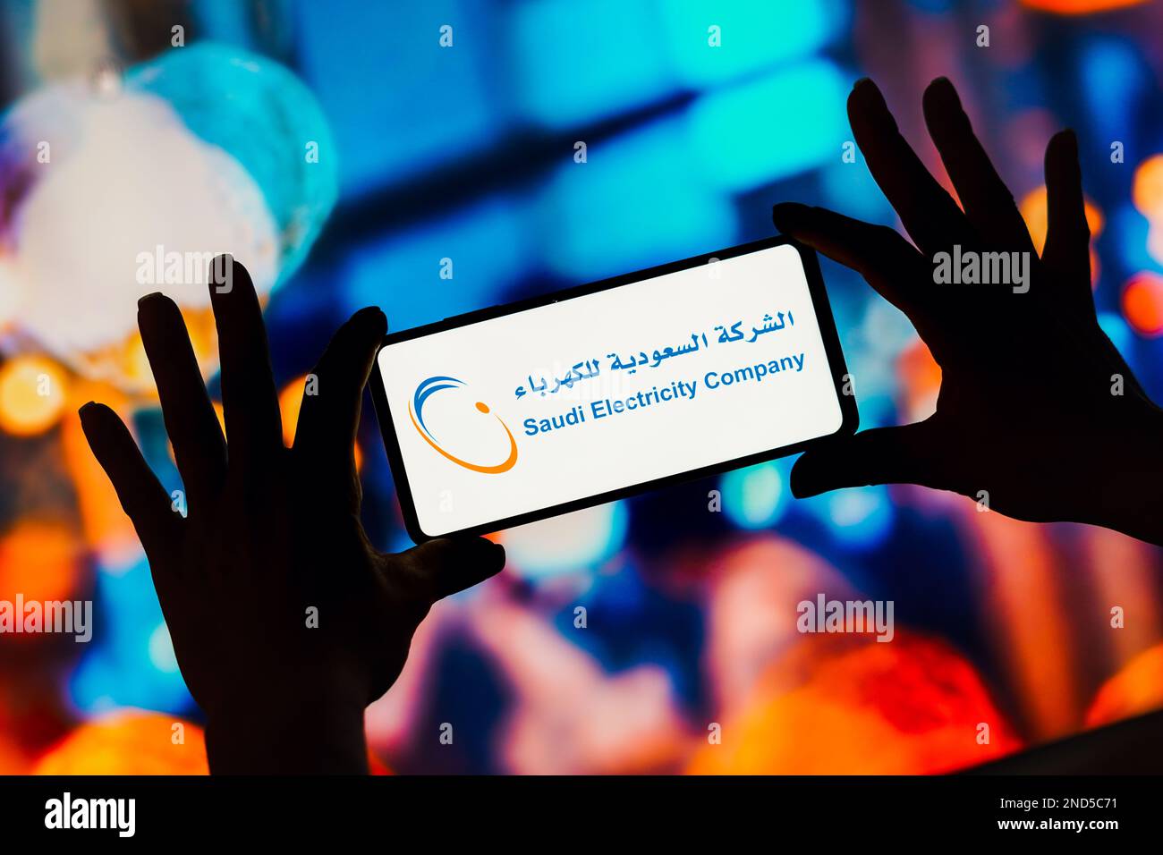 In this photo illustration, the Saudi Electricity Company logo is seen ...
