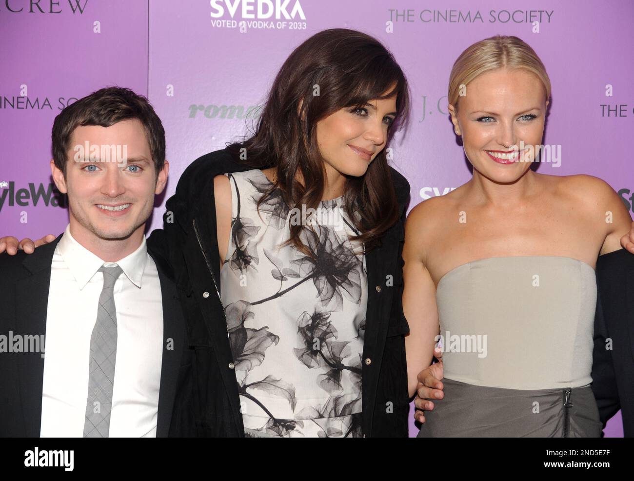 Actors Elijah Wood, left, Katie Holmes and Malin Akerman, right, attend ...
