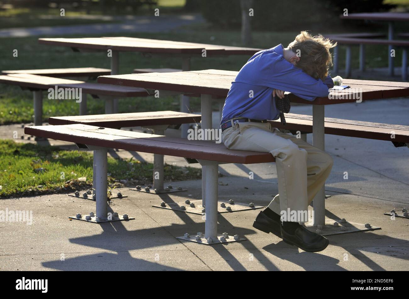 Christopher Gardner, 12, of Darien, Conn. waits outside for his mother ...