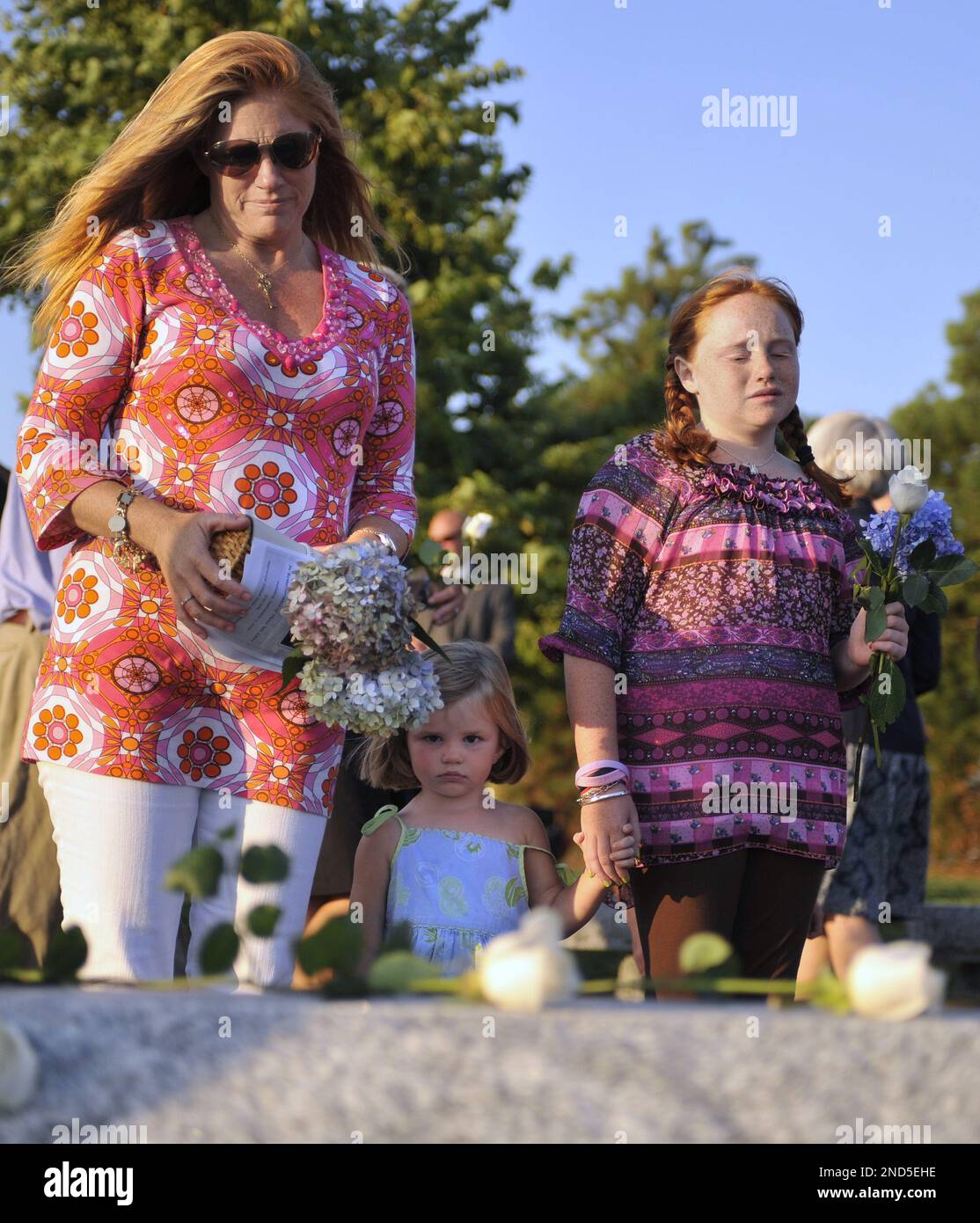 Jennifer Hunt, left, her niece Molly Woodward, center, and her daughter ...