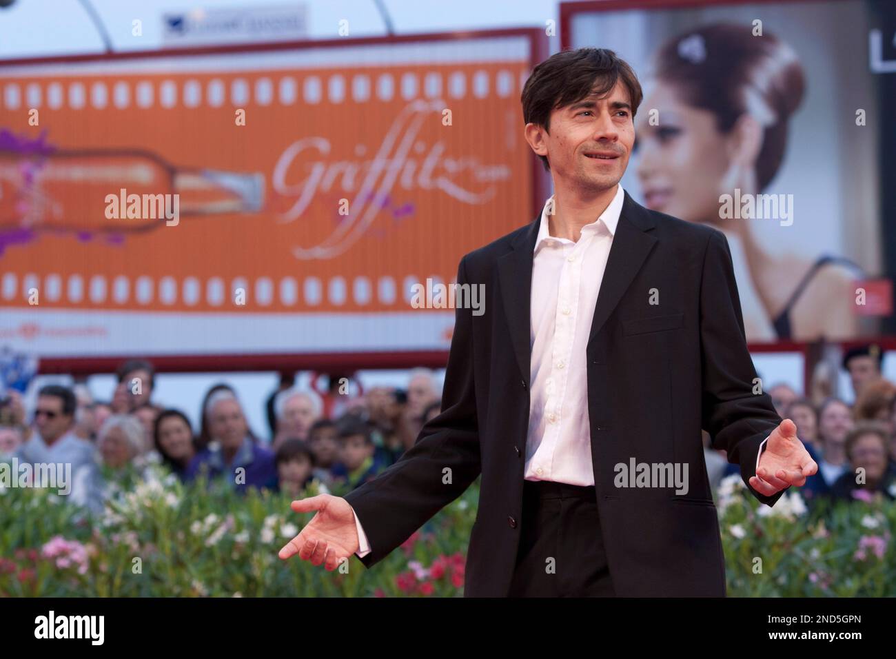 Actor Luigi Lo Cascio gestures as he arrives for the screening of the ...