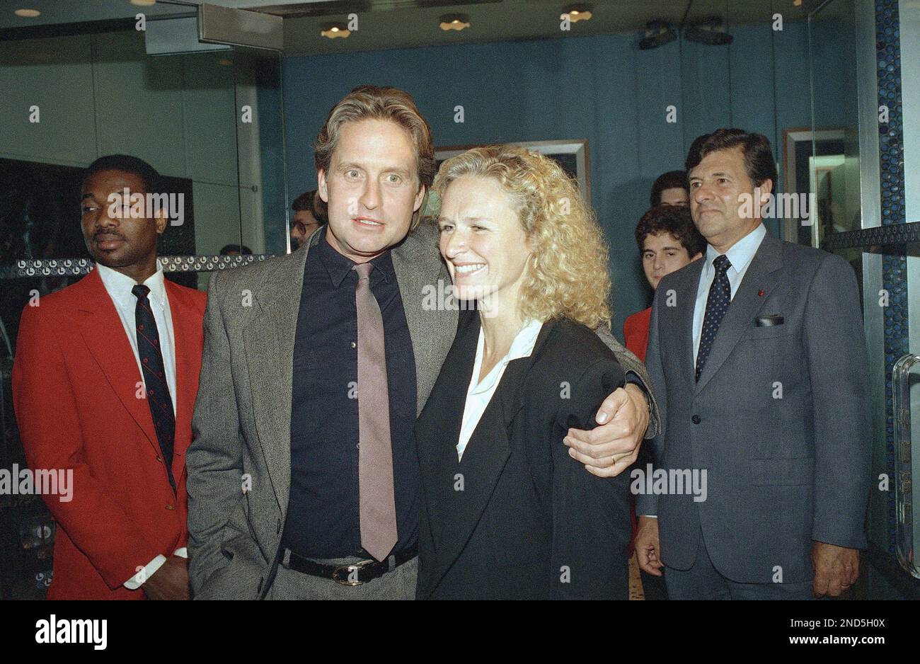 Actor Michael Douglas and actress Glenn Close pose outside the Loew's ...