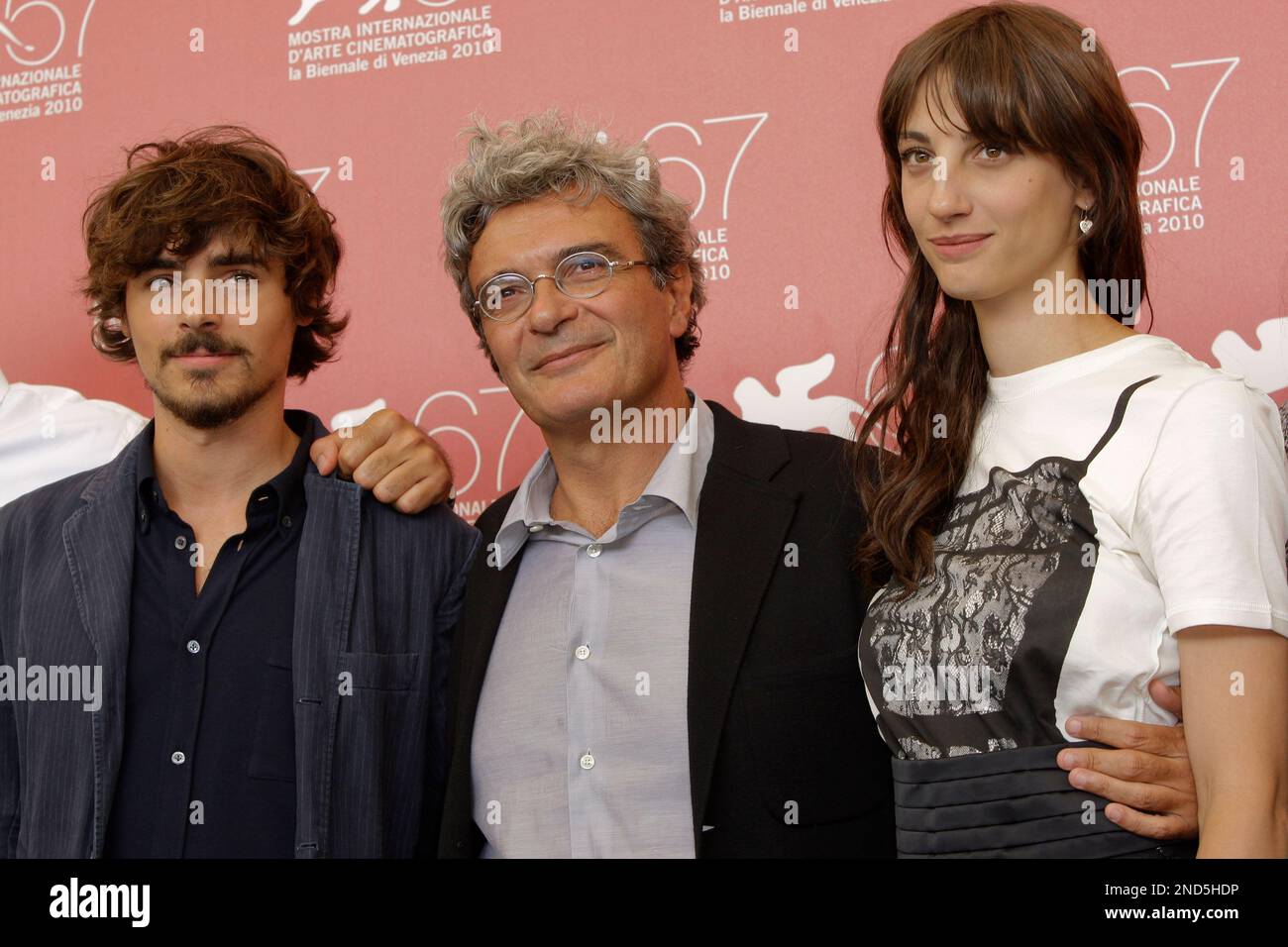 From left, actor Edoardo Natoli, director Mario Martone, and actress ...