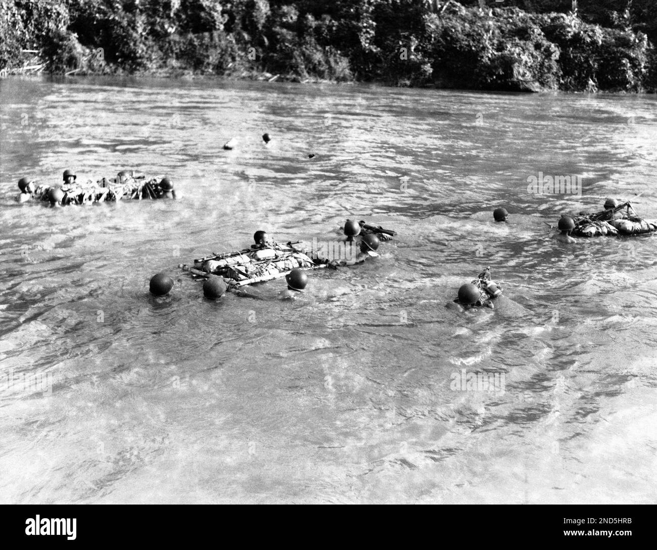 Chinese soldiers built rafts to cross a river Oct. 14, 1945. (AP Photo ...