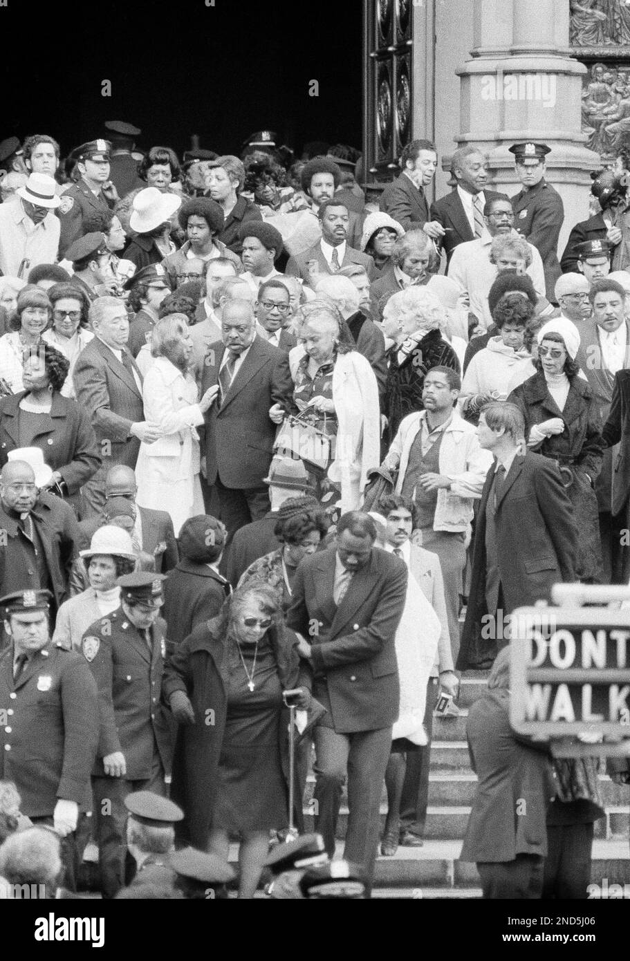 Mourners leave the cathedral of St. John the Divine in New York on May ...