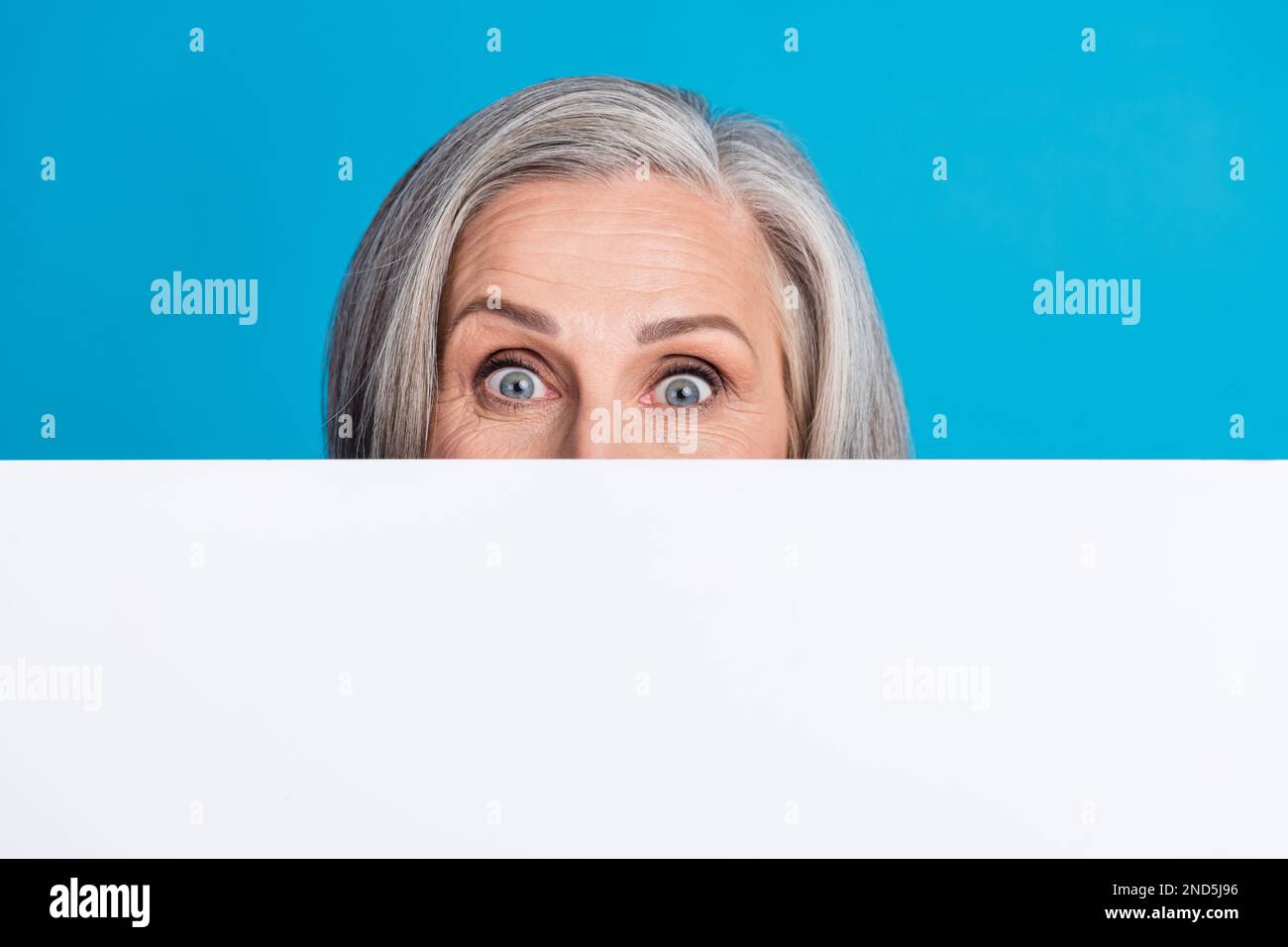 Photo of aged person half face peeking behind empty space blank ...