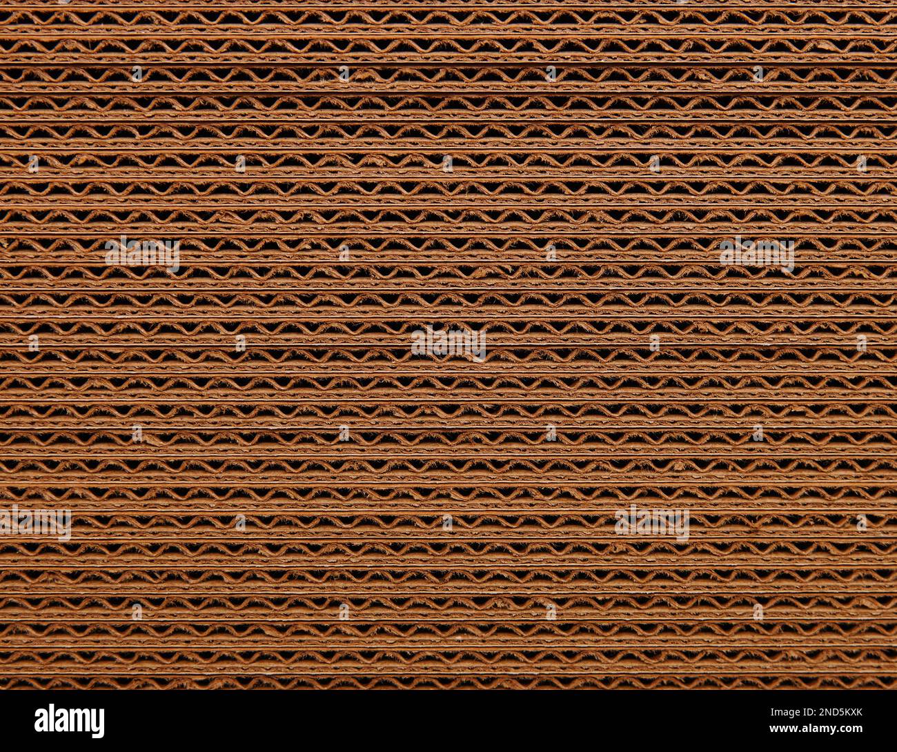 Corrugated cardboard. A stack of corrugated cardboard for packing ...