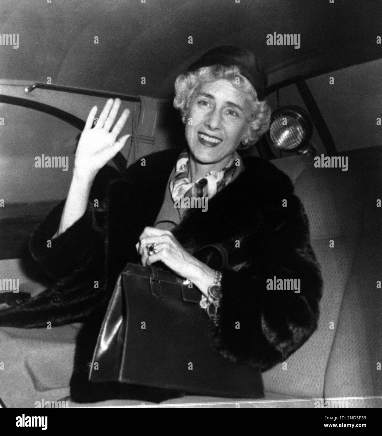Mrs. Clare Boothe Luce, former United States Ambassador to Italy, waves ...