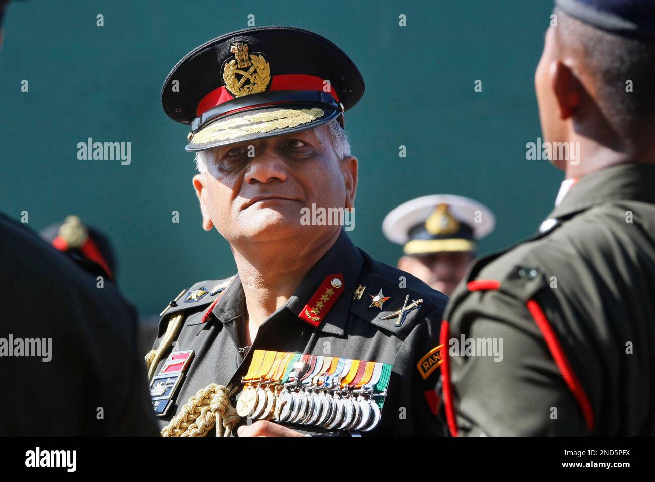 Indian army chief Gen. Vijay Kumar Singh, center, inspects a guard of ...
