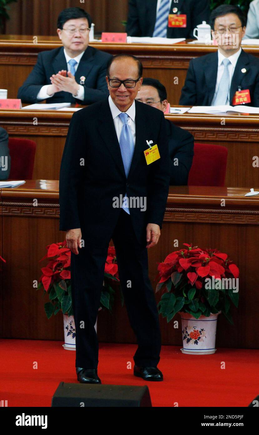 Hong Kong tycoon Li Ka-shing smiles before giving a speech at a ...