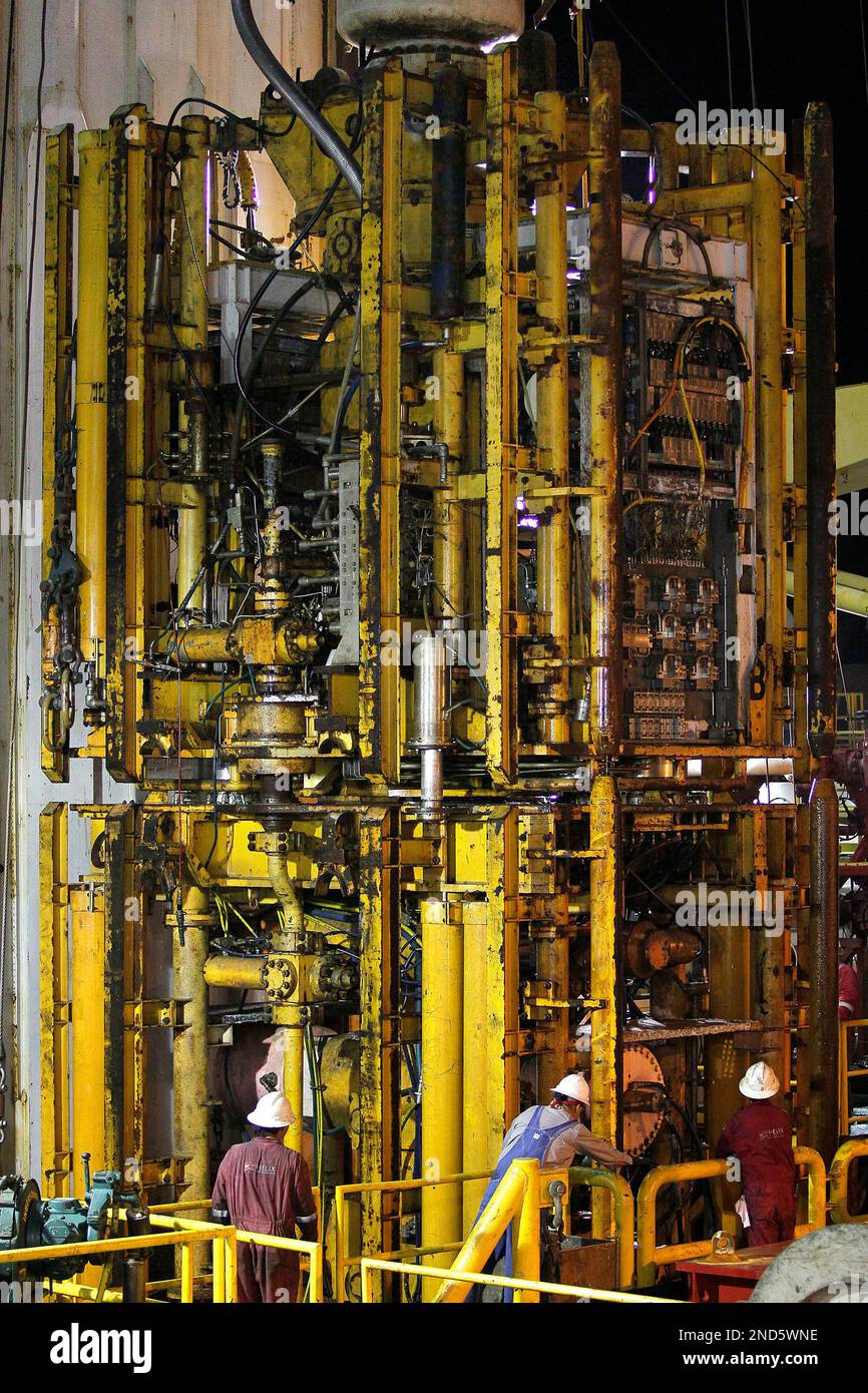 Workers watch as the Deepwater Horizon blowout preventer stack is ... Workers watch as the Deepwater Horizon blowout preventer stack is ...
