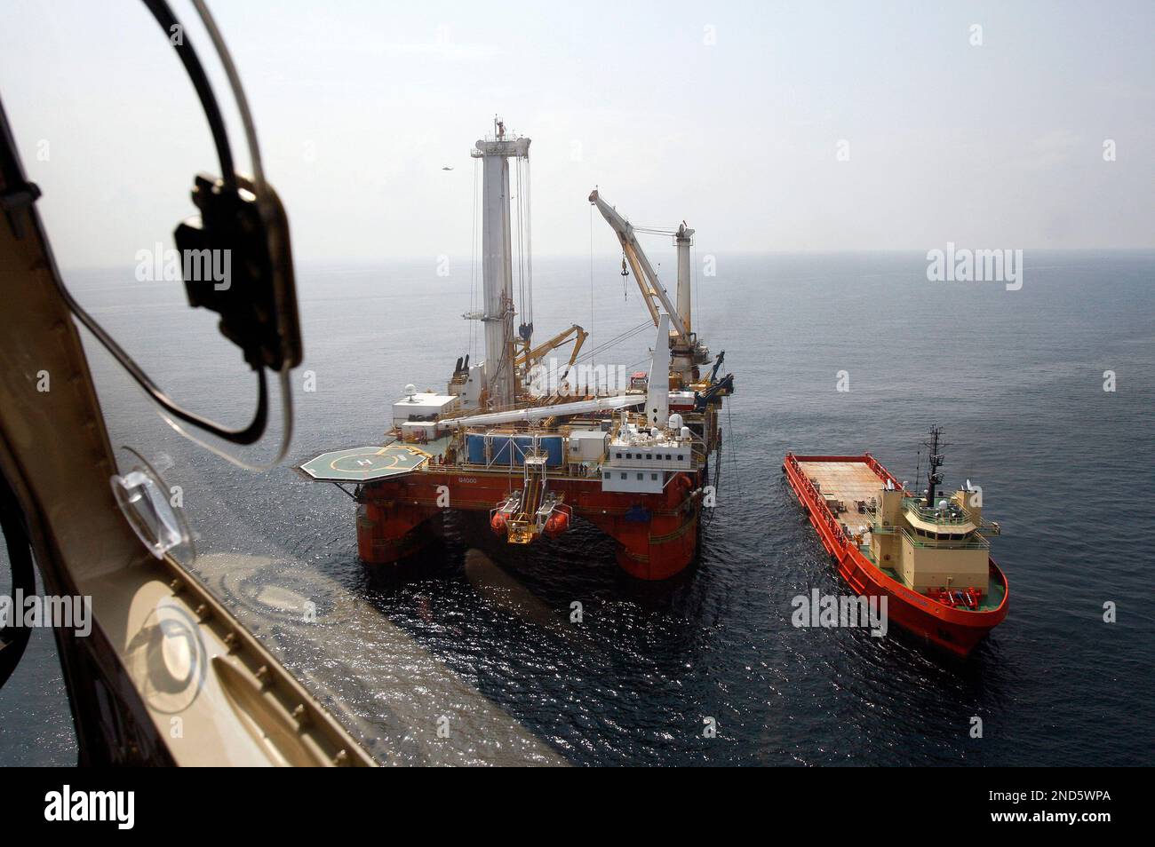 In this Sept. 4, 2010 picture, the Helix Q4000, center, the vessel ...