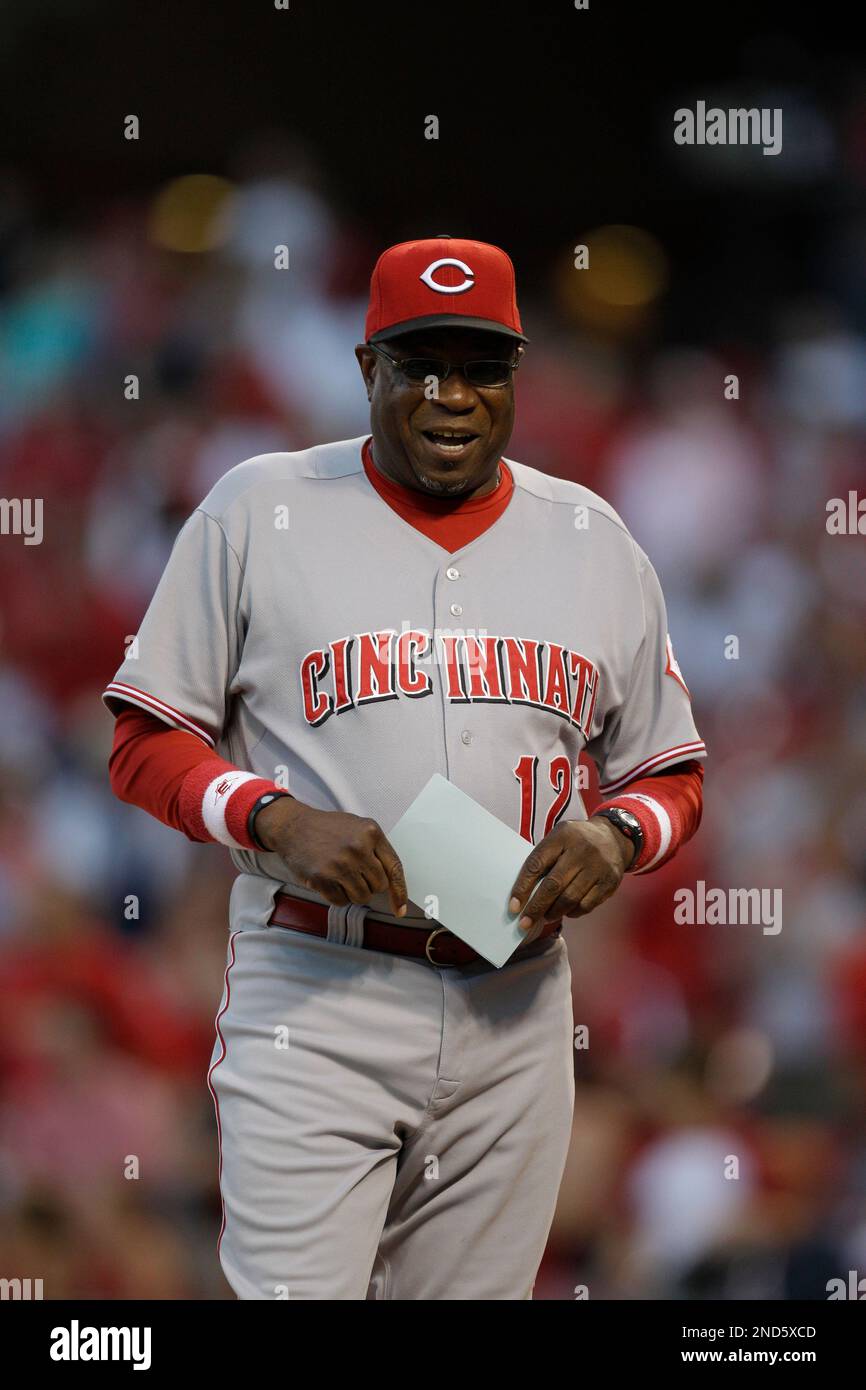 Cincinnati Reds manager Dusty Baker prepares to turn in his lineup card ...
