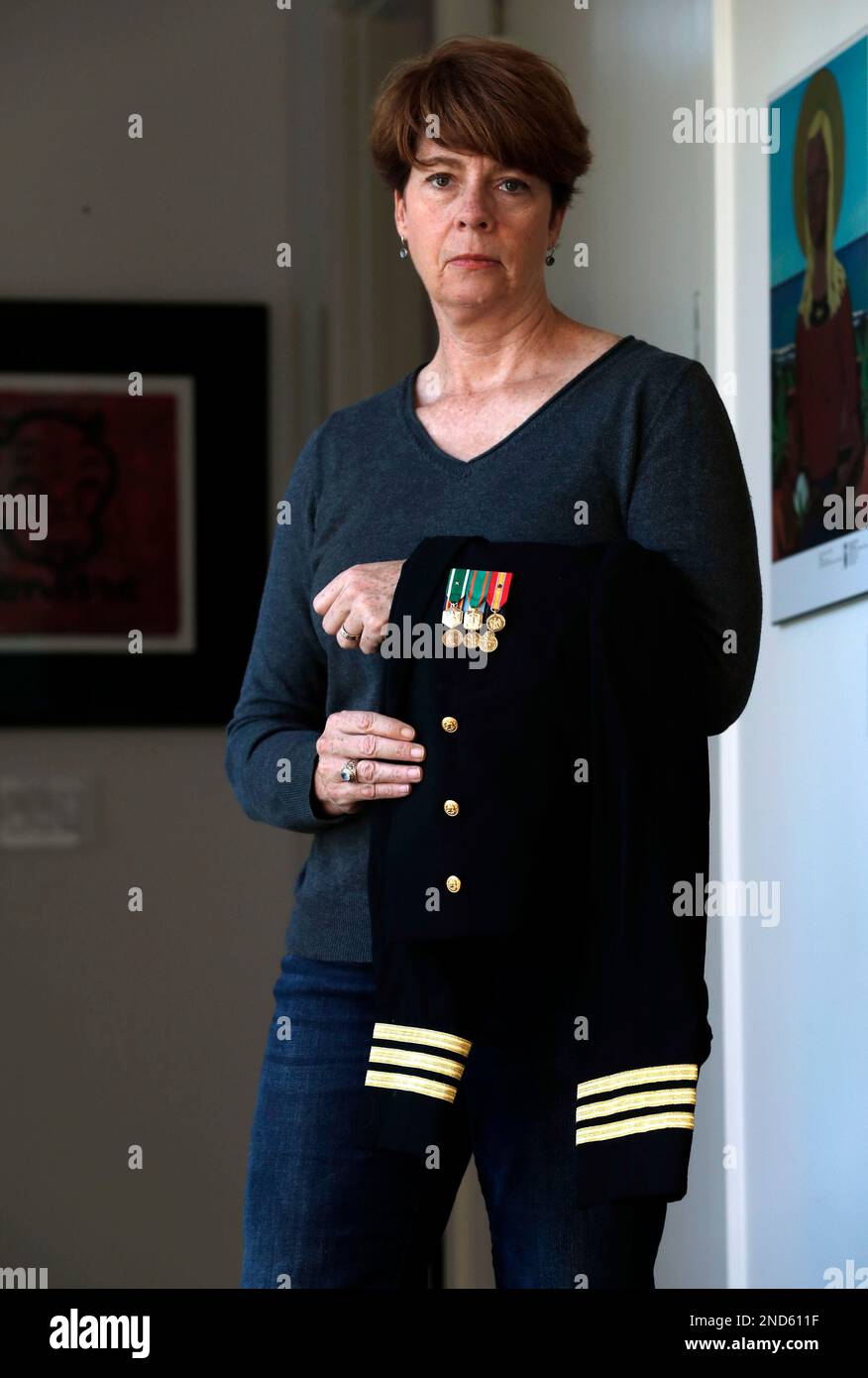 Retired Navy Commander Zoe Dunning with her mess dress jacket, formal ...