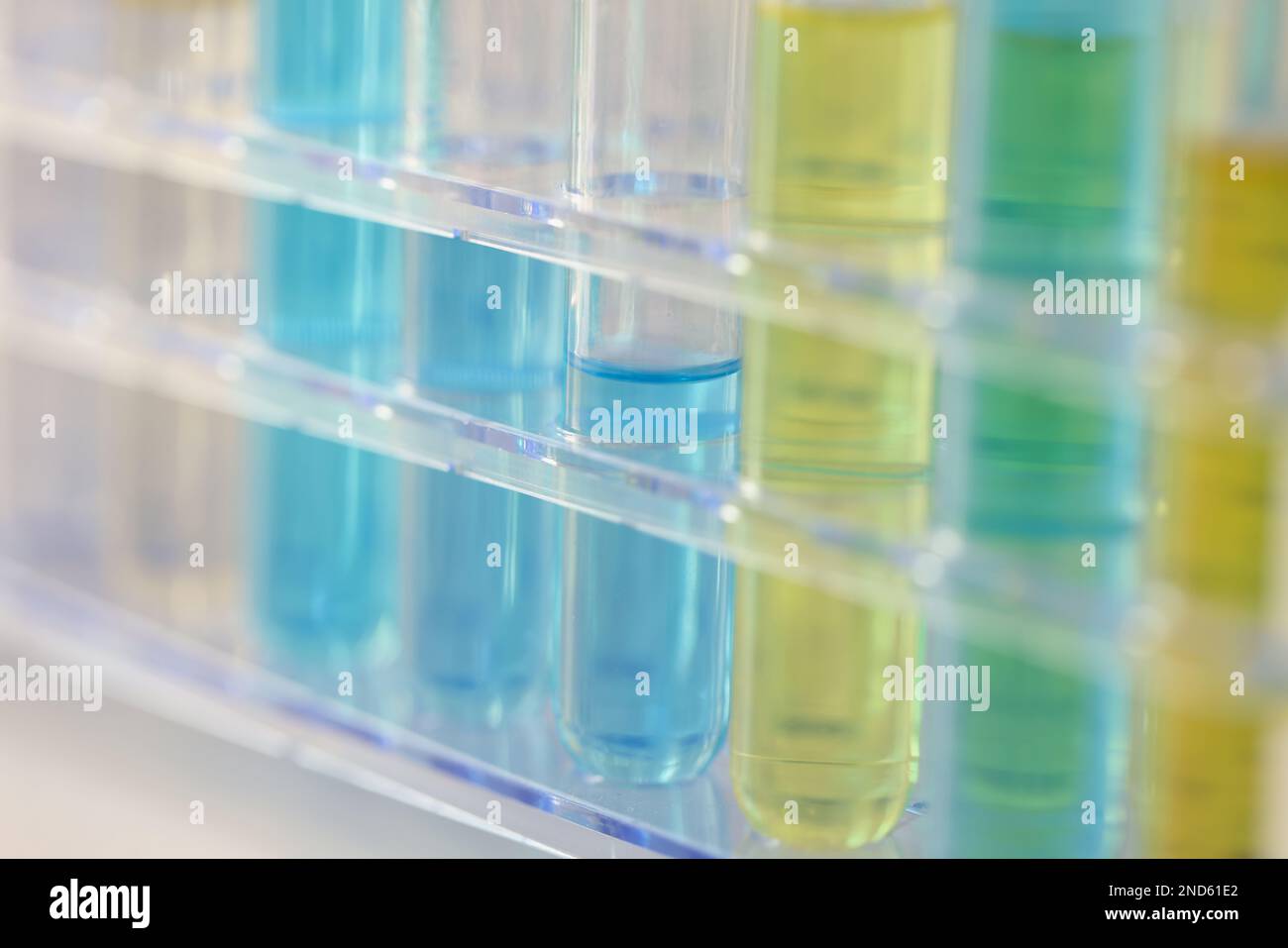 Test tubes with yellow and blue reagent, shallow focus Stock Photo - Alamy