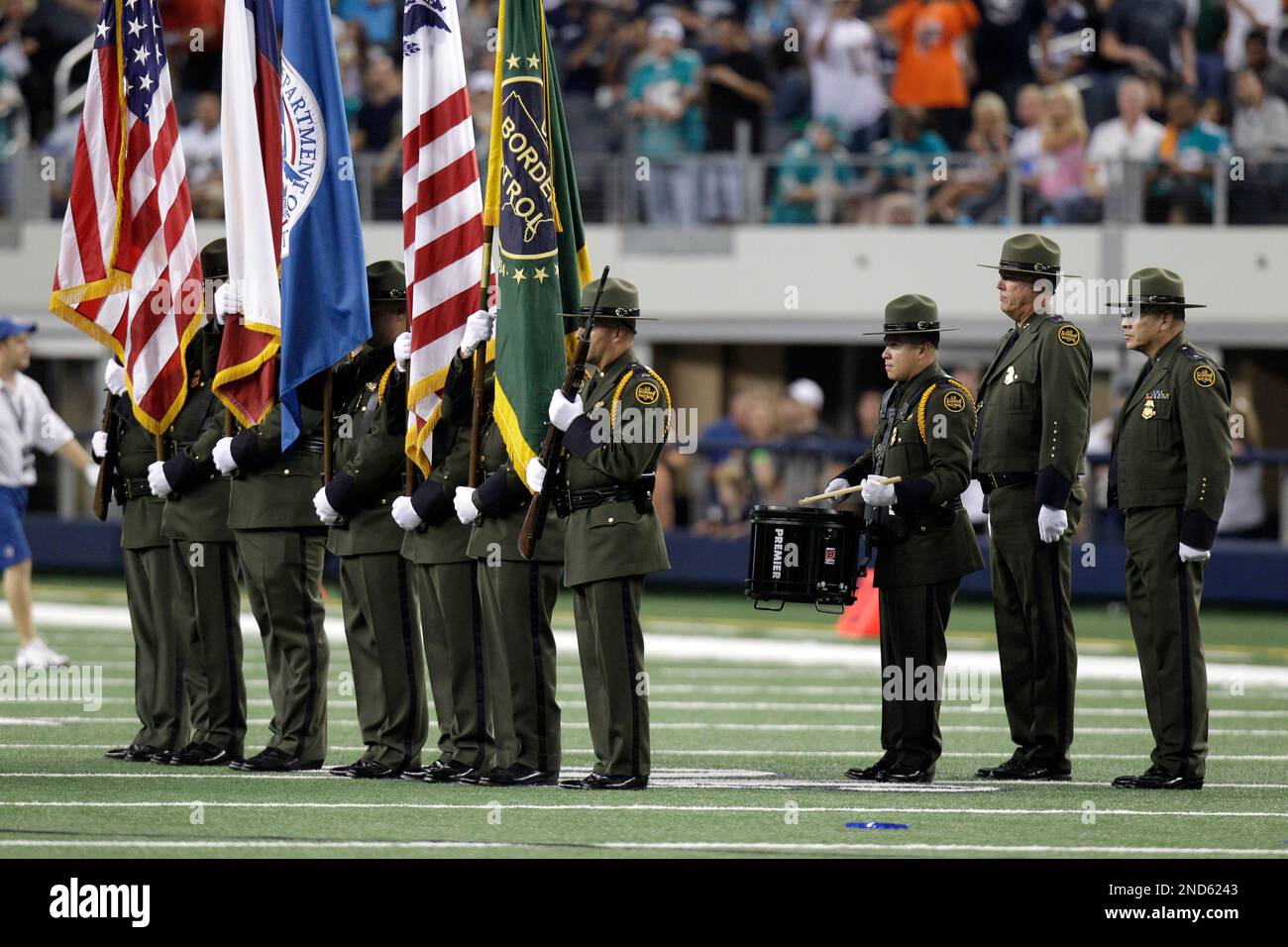U.S. Border Patrol honor guard before a preseason NFL football game ...