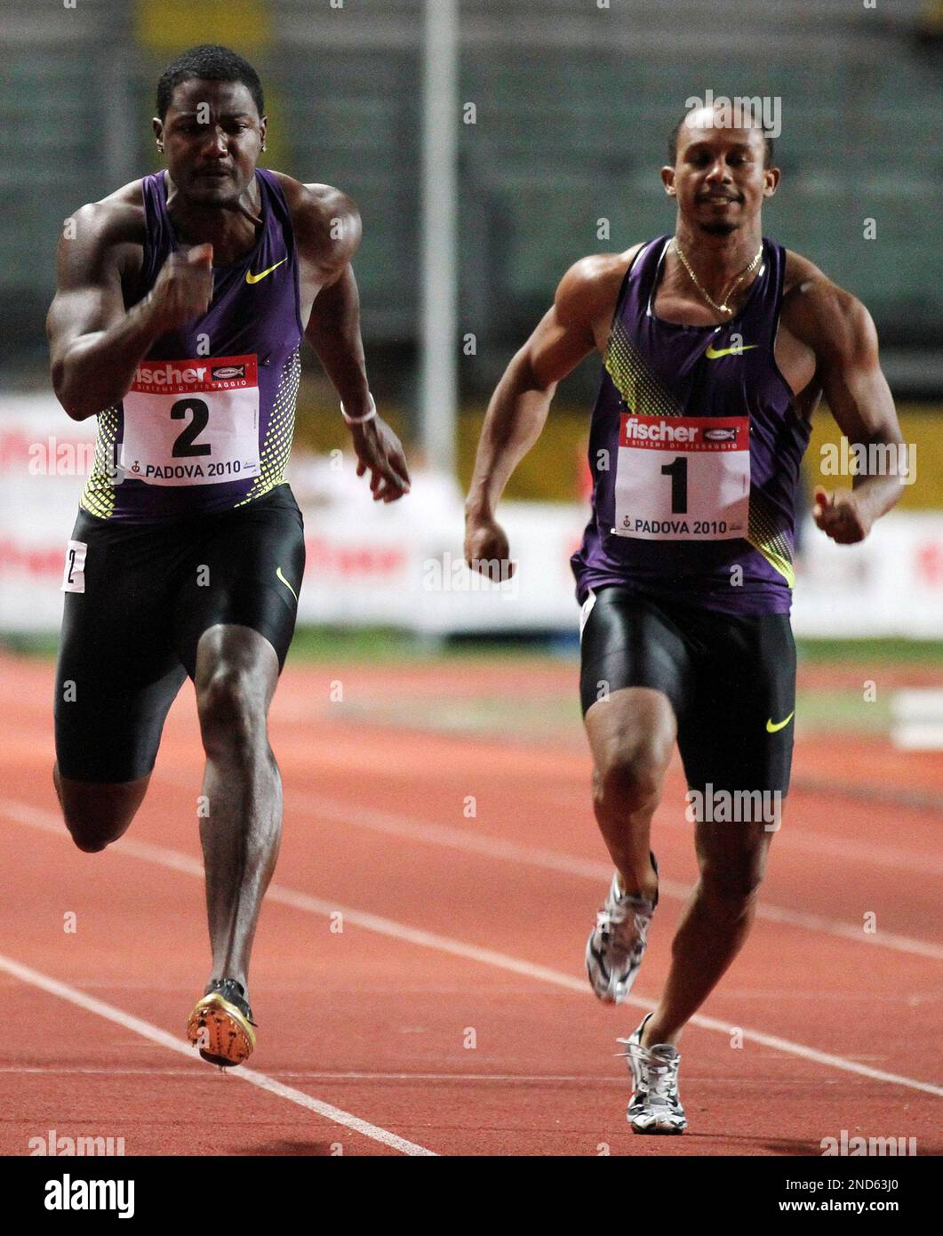 USA's Justin Gatlin, left, and Jamaica's Michael Frater, right, compete ...