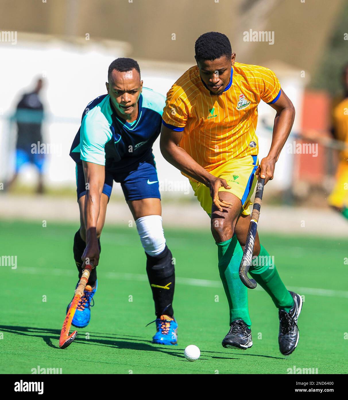 Nigeria Police Henry Jabeoba dribbles past Khalsa Moshi James Paulo ...