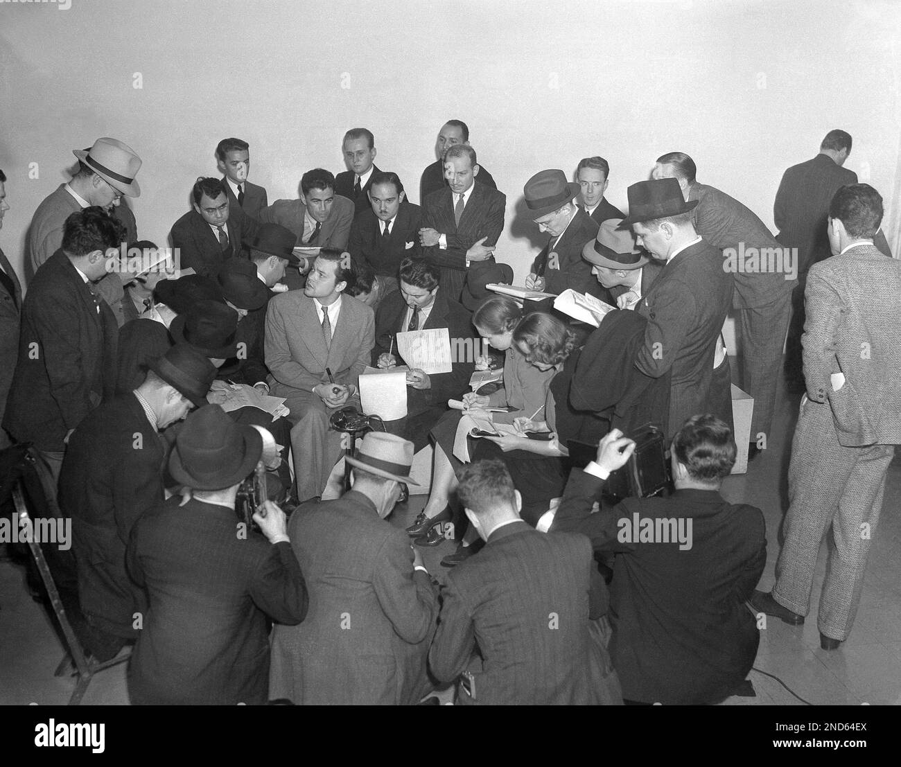 Orson Welles, center, young director who presented the dramatization of ...
