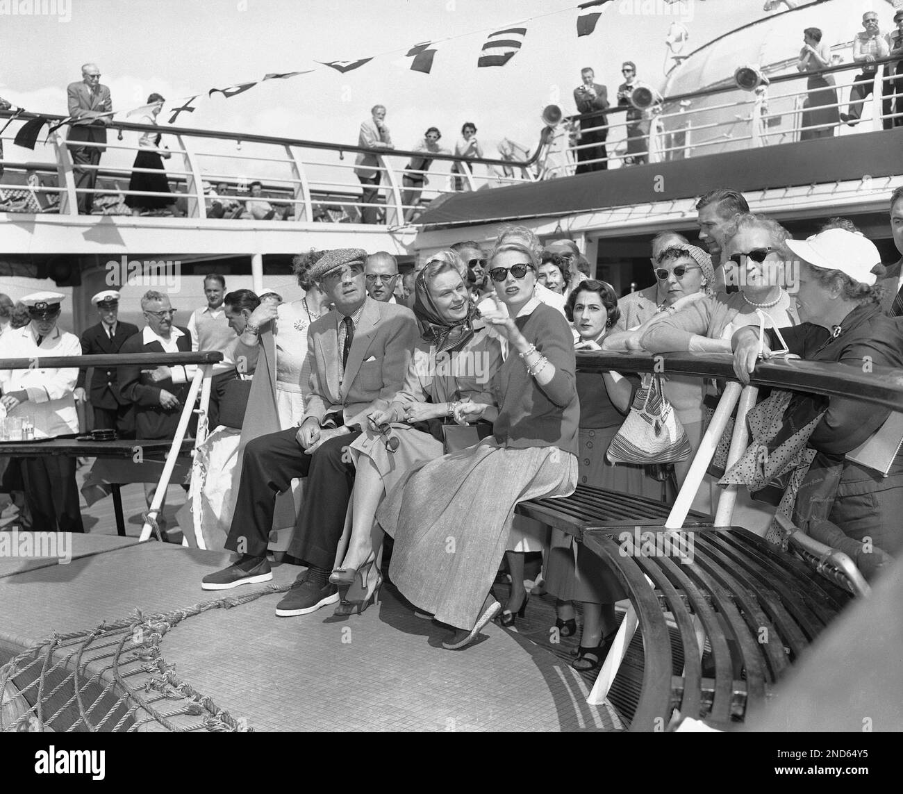 Grace Kelly with her father, John B. Kelly, and her mother sitting by ...