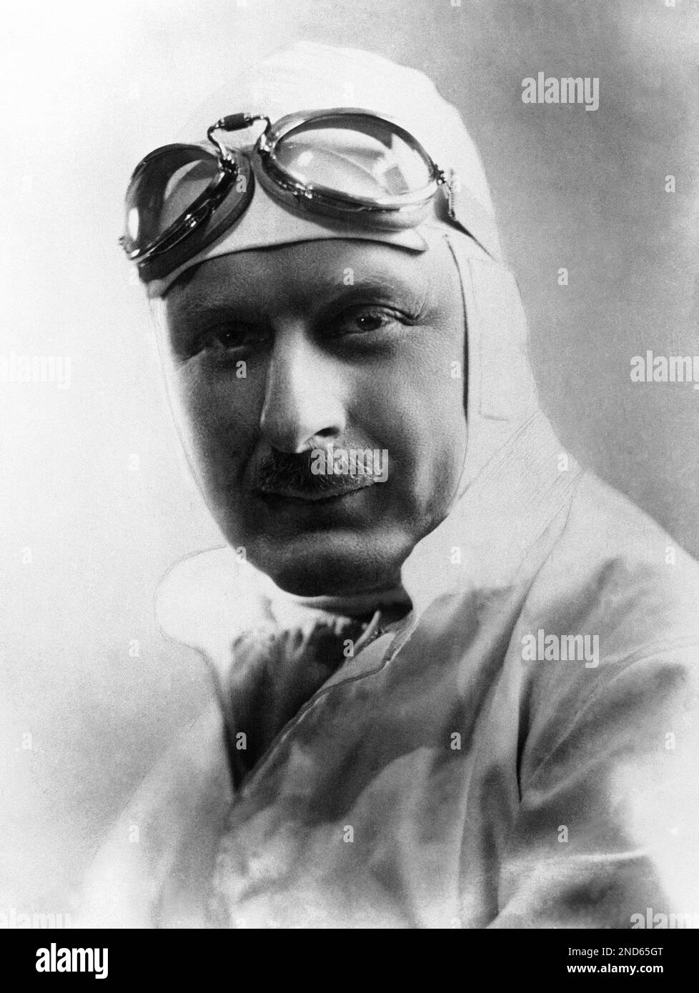 A portrait photo of Kaye Don, the British racing motorist shown around ...