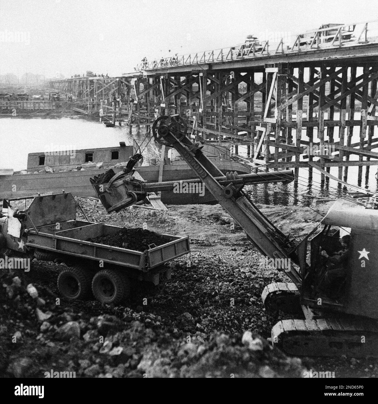 View of pile bridge built across the Maas on March 27, 1945, as a ...
