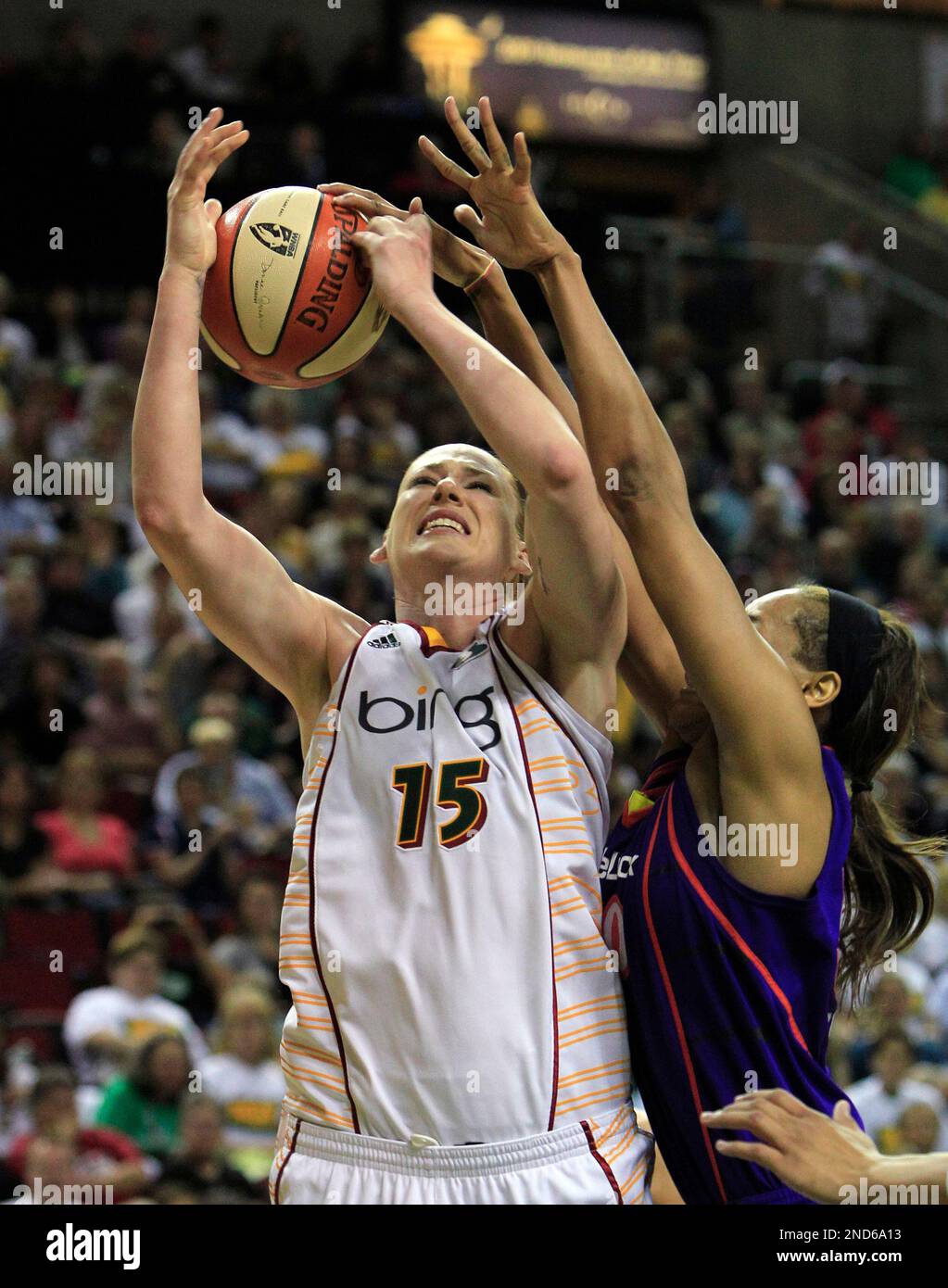 Seattle Storm's Lauren Jackson (15) is fouled by Phoenix Mercury's ...