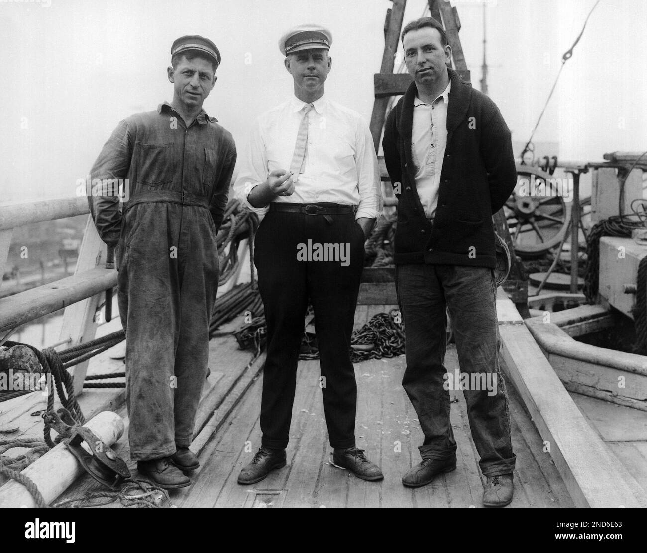 Left to right are: John J. Bayer, water tender; Captain Frederick C ...