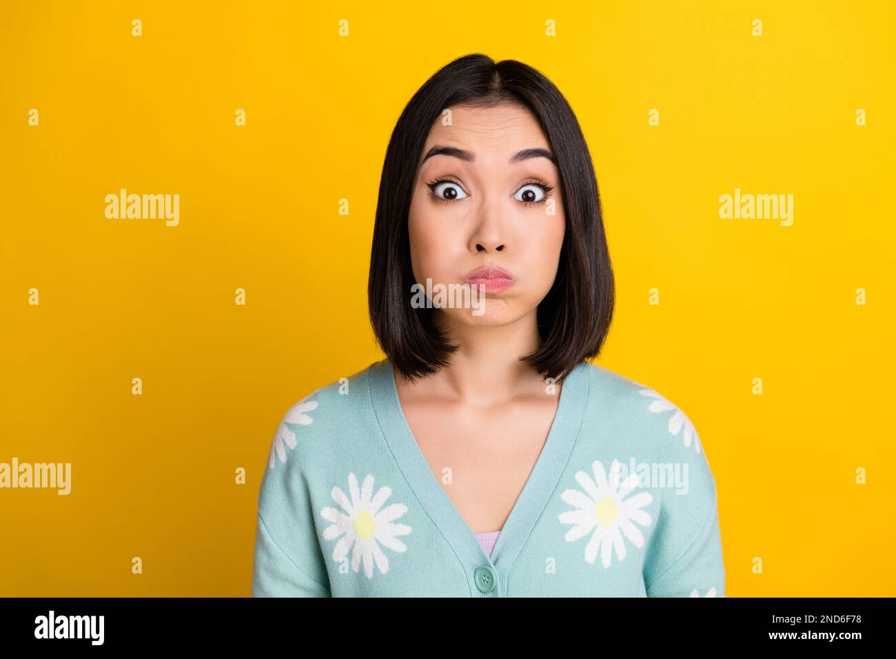 Closeup portrait of funky childish goofy japanese girl black bob ...