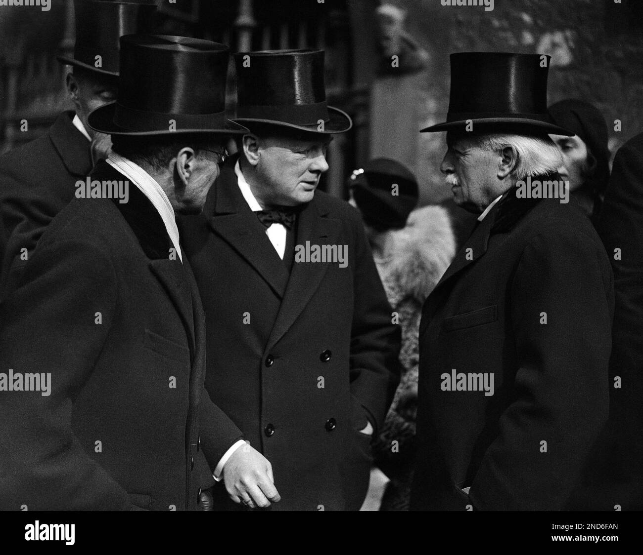 David Lloyd George, right and Winston Churchill, center, at the ...