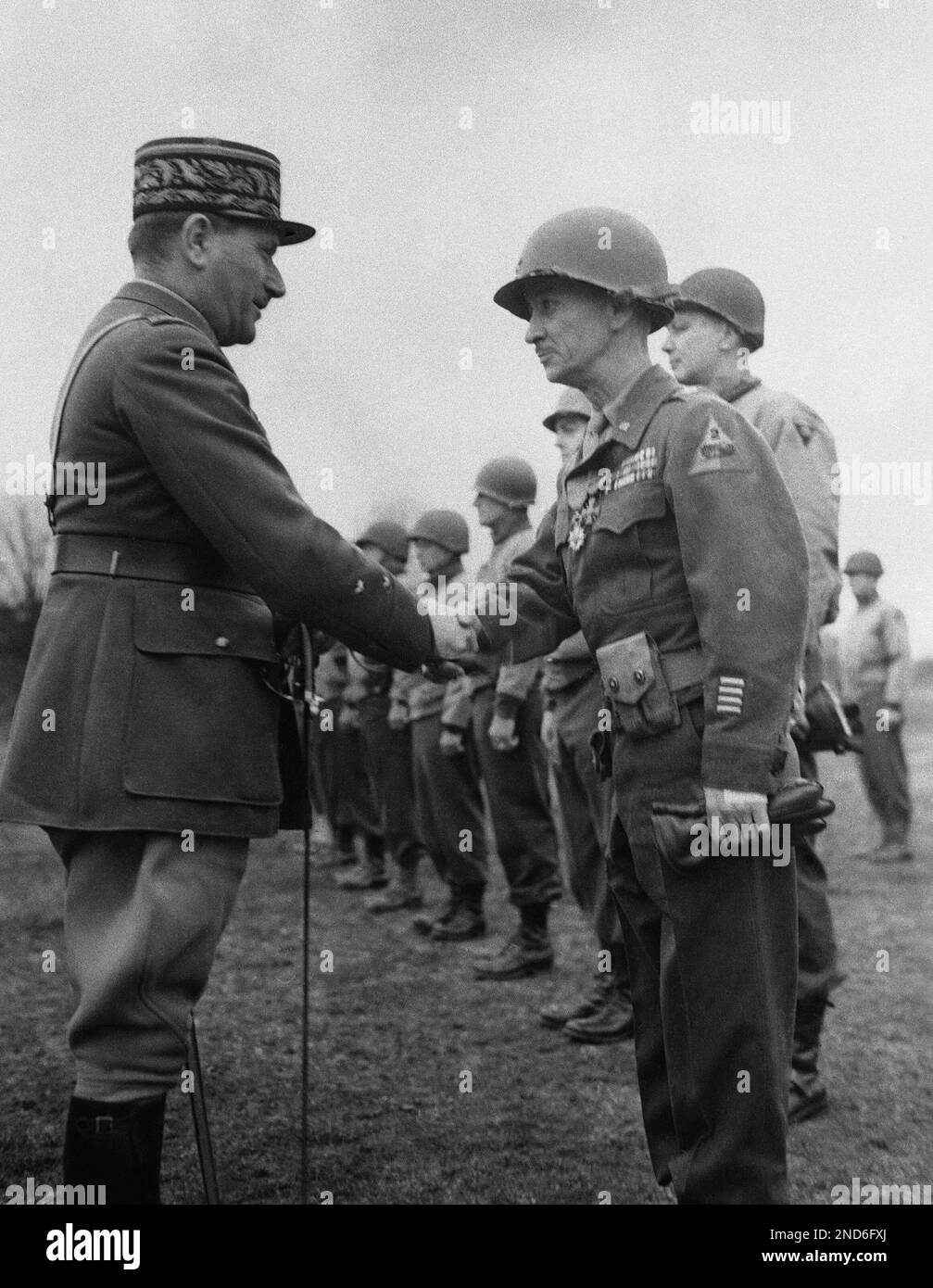 General Koeltz, of the French Army, left, congratulates Brigadier ...