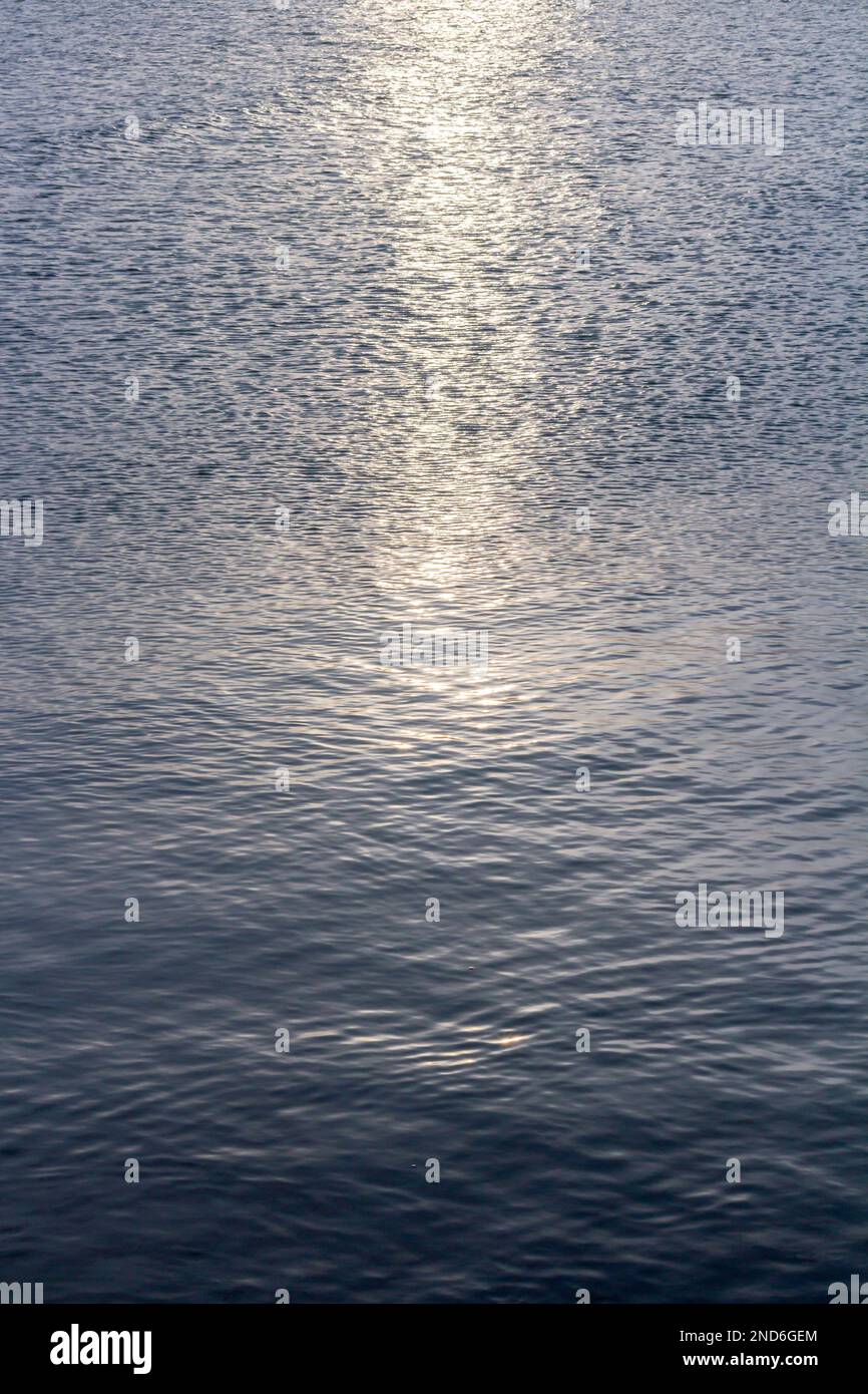 Detail of a sunlight reflecting in glittering sea. sparkler in water ...