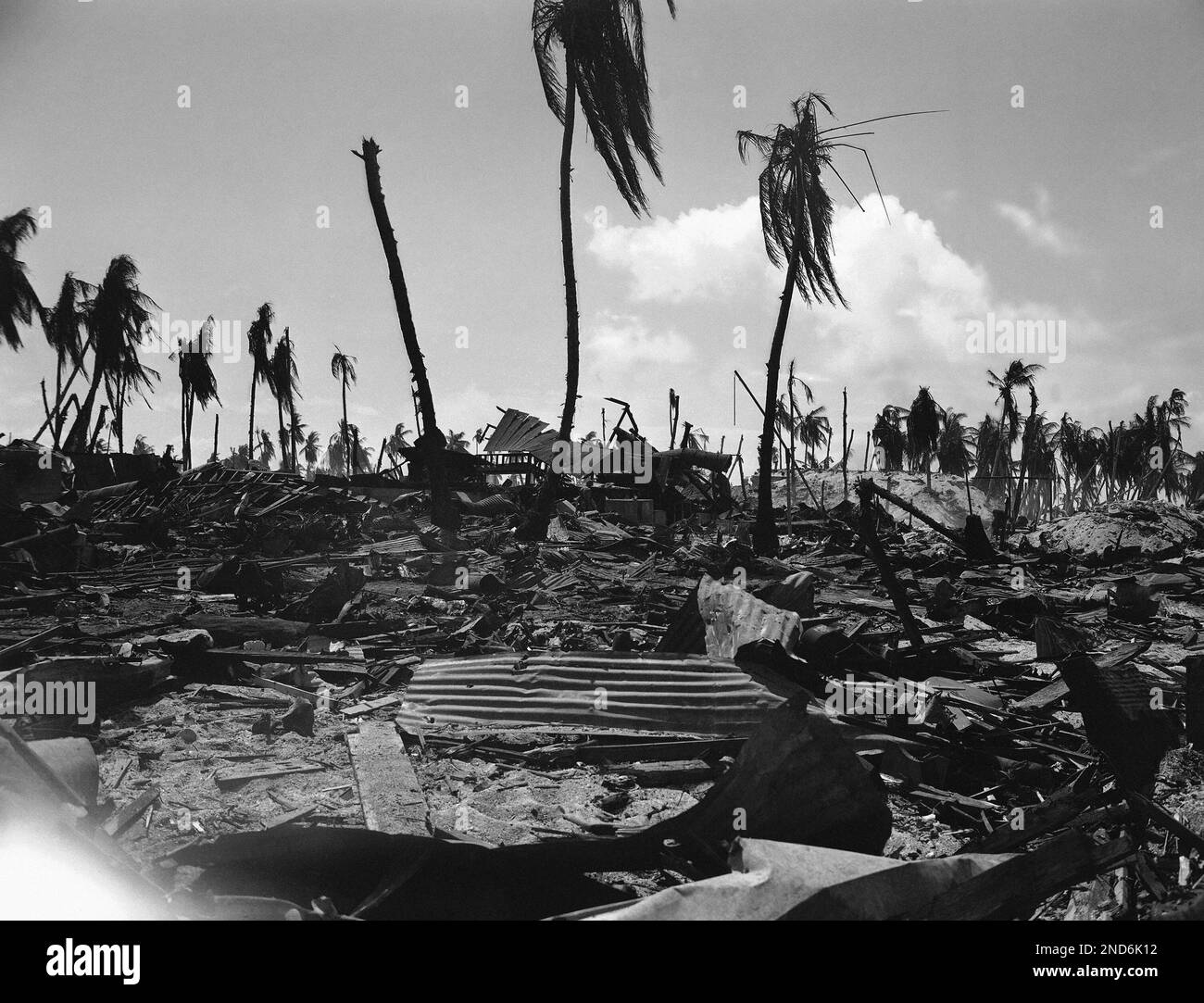 Air and naval bombardment reduced this once Japanese bivouac area, on ...