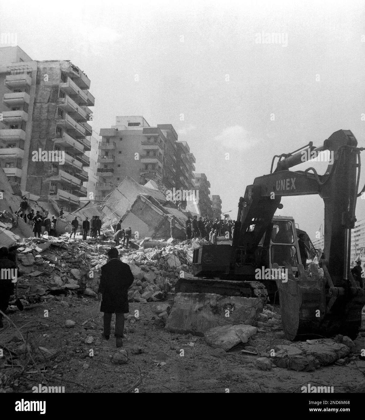 A collapsed block of flats in the Militari district in Bucharest ...